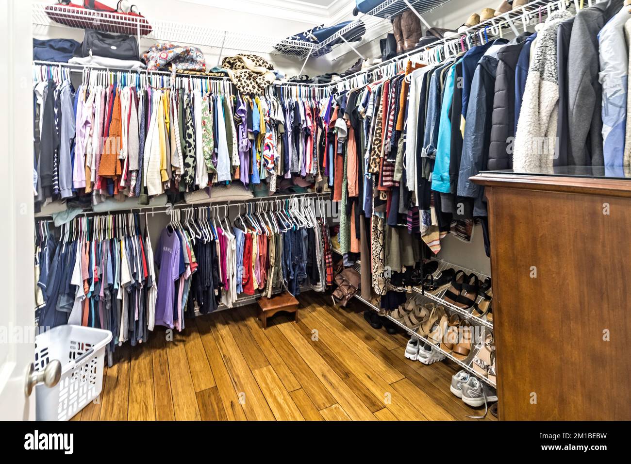 A full and stuffed master bedroom closet in a new construction home ...
