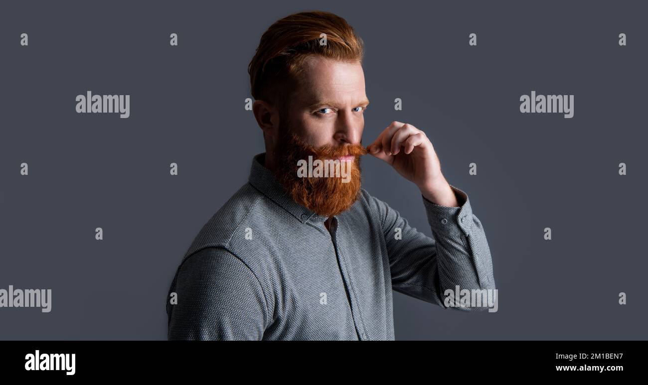 studio shot of unshaven guy. moustache and beard care. handsome ...