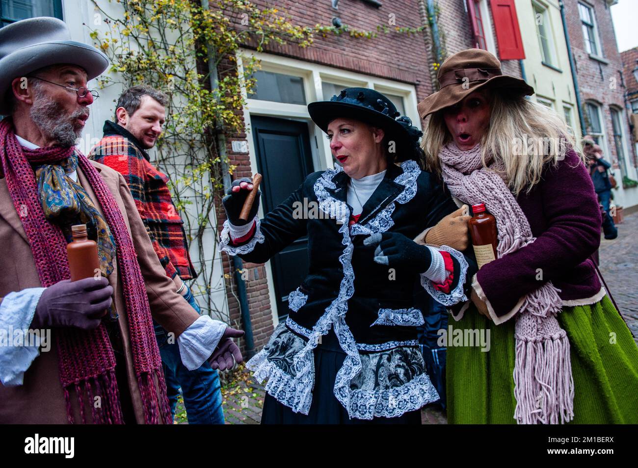A group of people seen playing drunk characters from the Victorian era ...