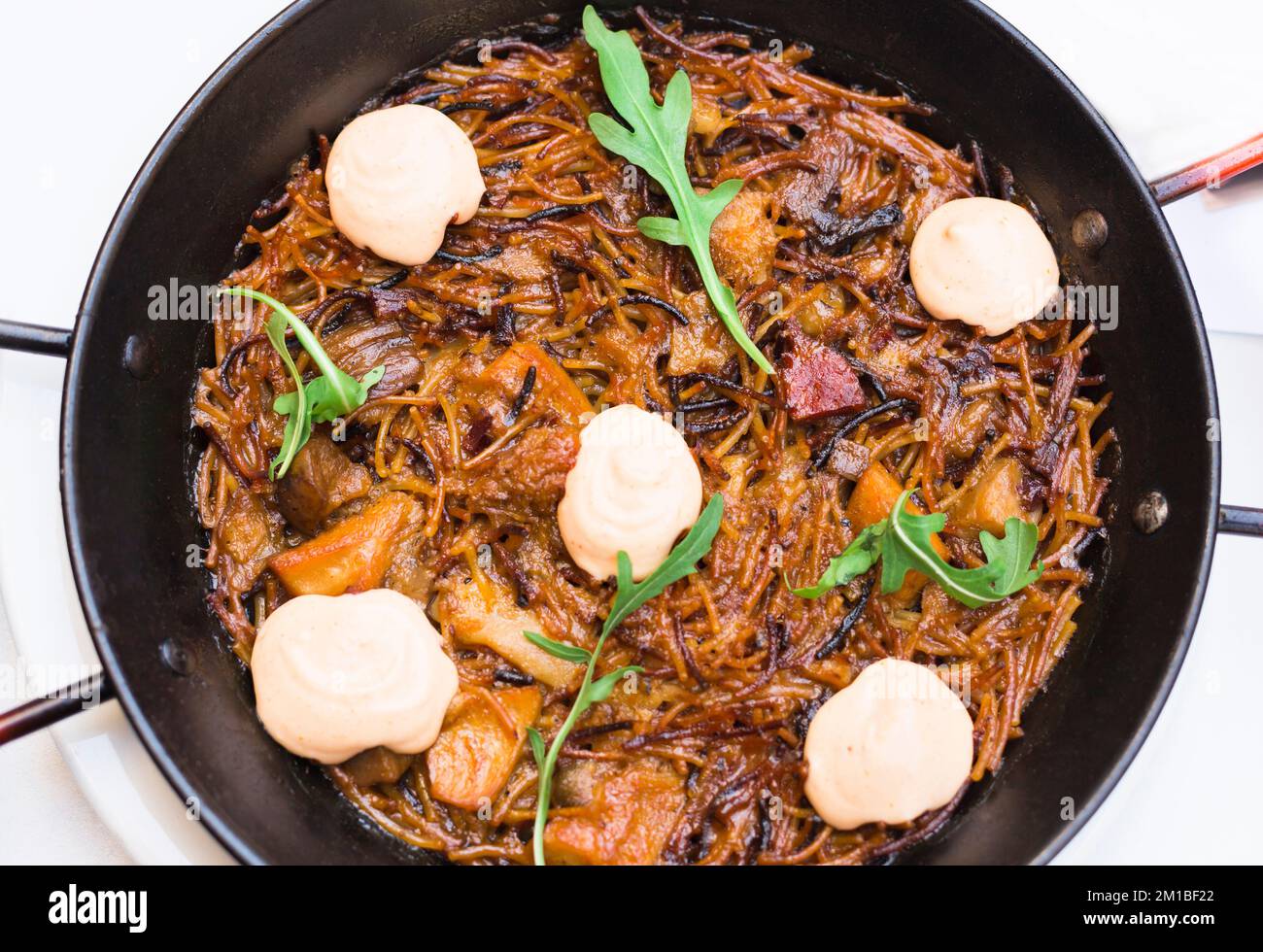 Delicious spanish fideua seafood hi-res stock photography and images ...