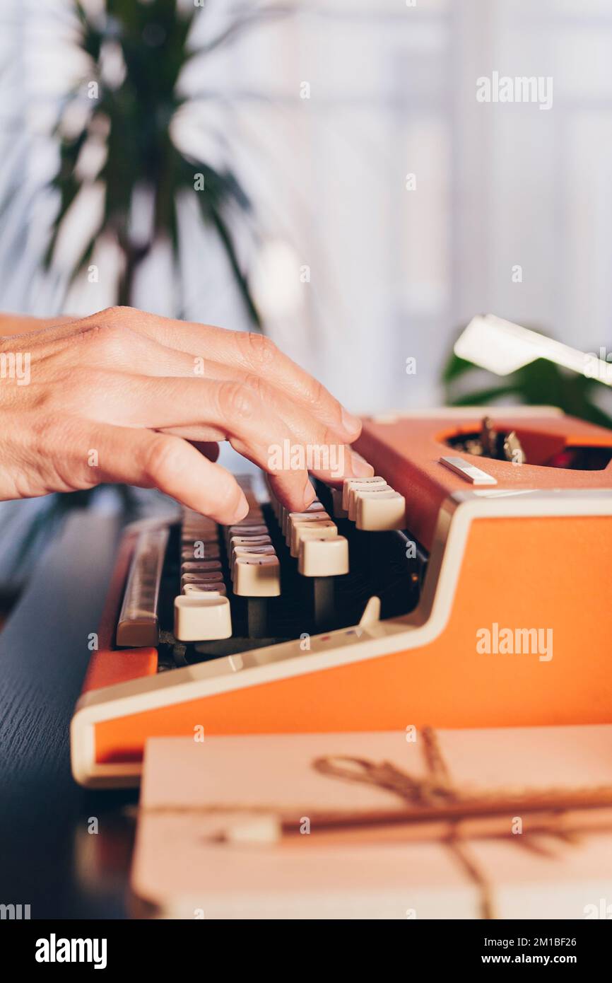 Writer's hands on retro typewriter. Old fashion Stock Photo - Alamy