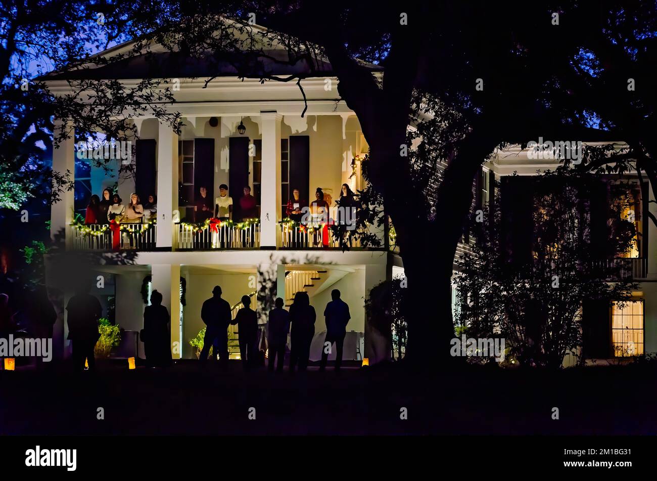 People listen to Christmas carols at Oakleigh Mansion during ... People listen to Christmas carols at Oakleigh Mansion during ...