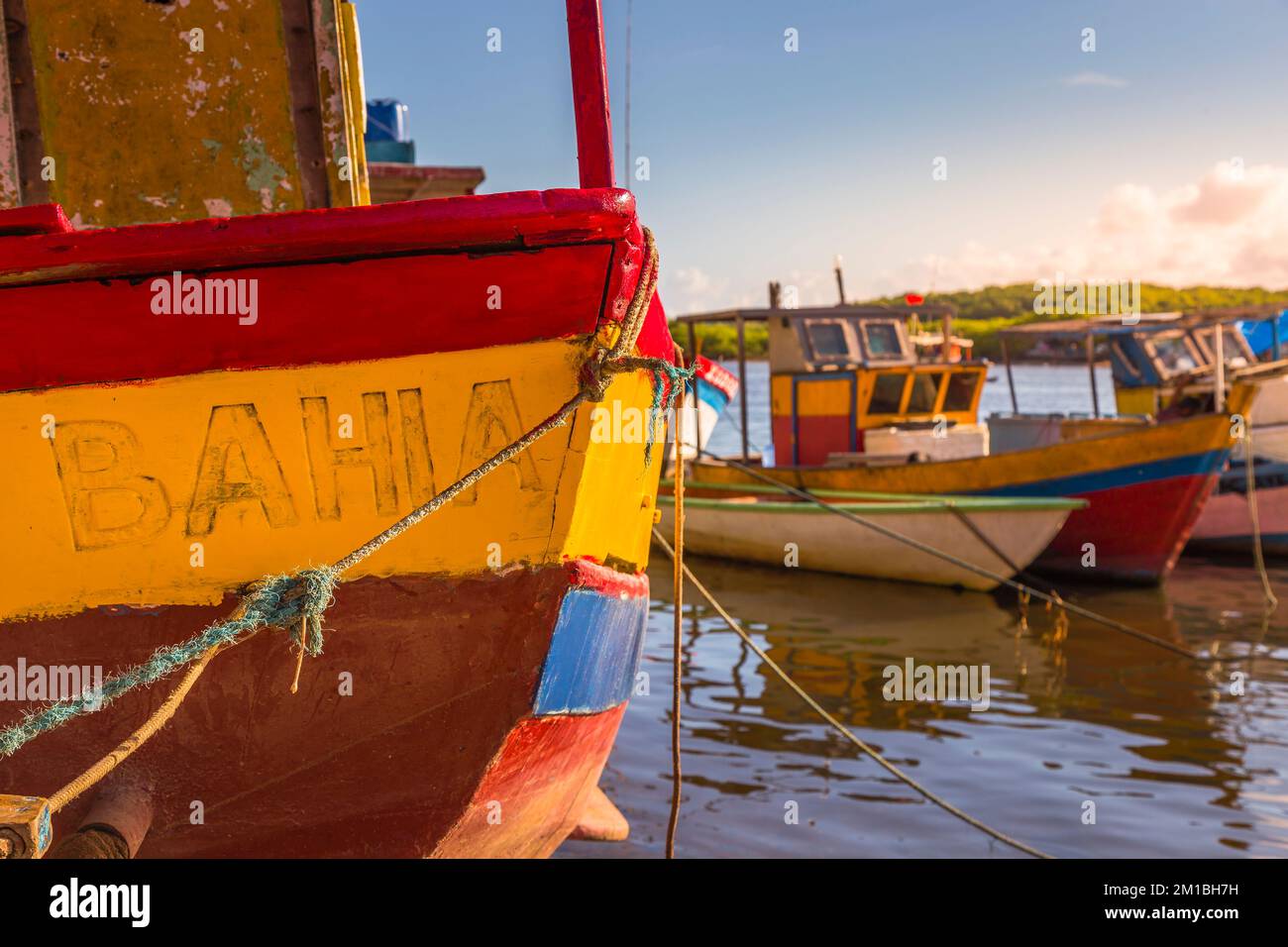 Bay at sunset with fishing trawler rustic boats in Porto Seguro, BAHIA ...