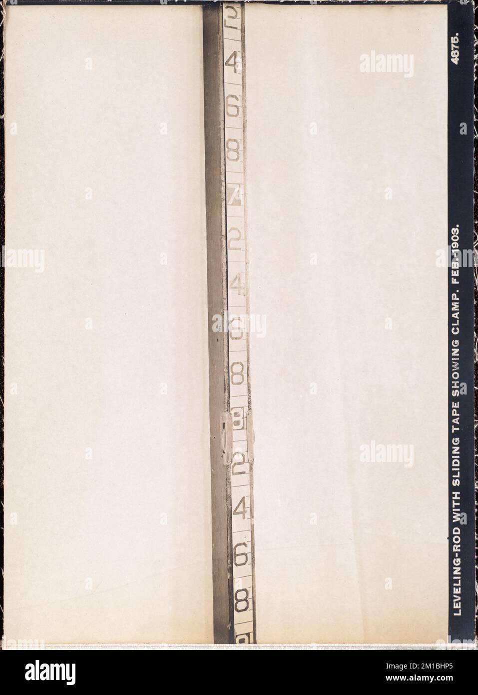 Wachusett Reservoir, leveling rod with sliding tape, showing clamp ...