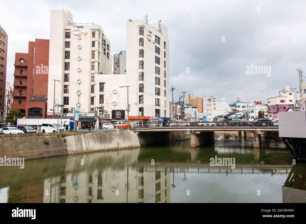 Fukuoka, Japan - November 13th 2022. Nakasushin Bridge and the banks of ...
