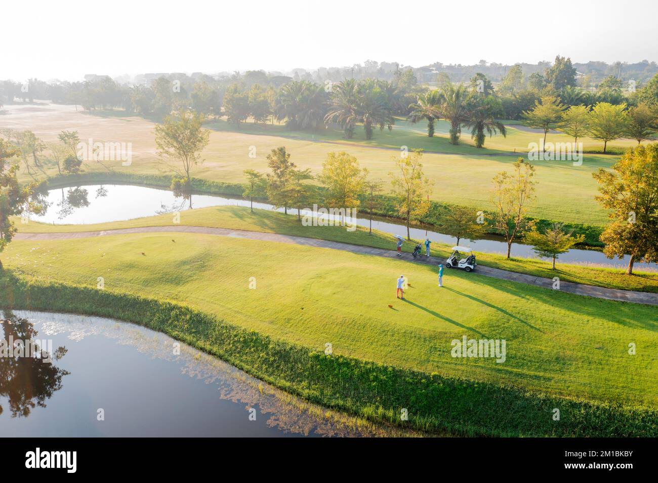 Aerial view Green Golf course in the morning Stock Photo - Alamy