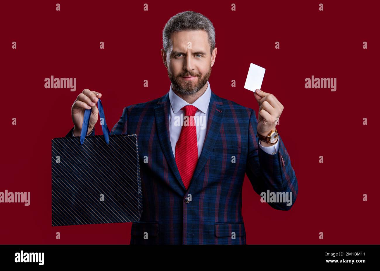 man hold shopping bag and discount card with copy space. photo of man ...