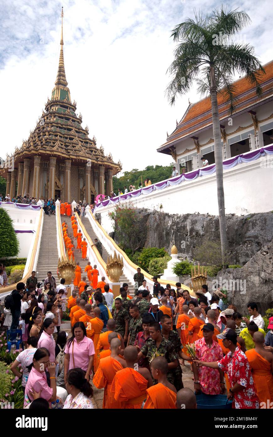 Many Thai people Give Flowers to Buddhist Monks for alms in The Tak Bat ...