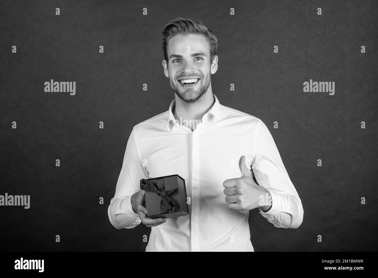 Happy guy showing thumb Black and White Stock Photos & Images - Alamy