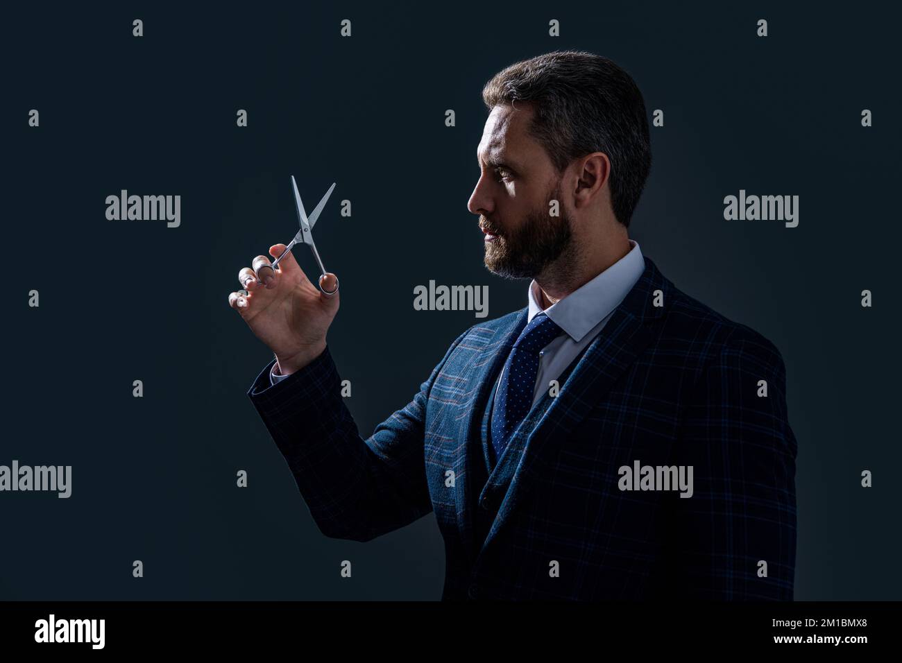 hairsdresser man with scissors, copy space. man with scissors in ...