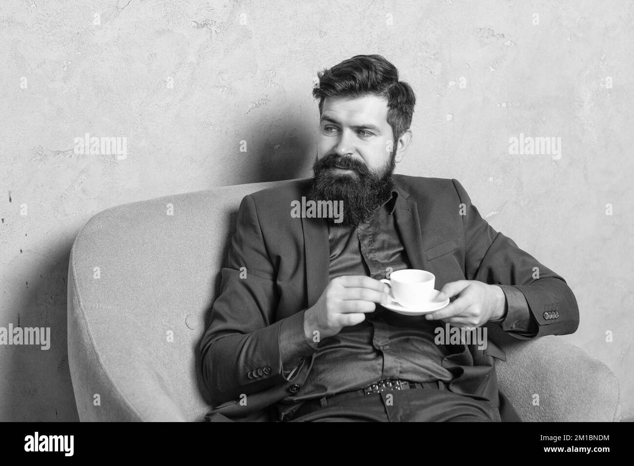 Just relax and calm yourself. Professional man relax drinking tea in ...