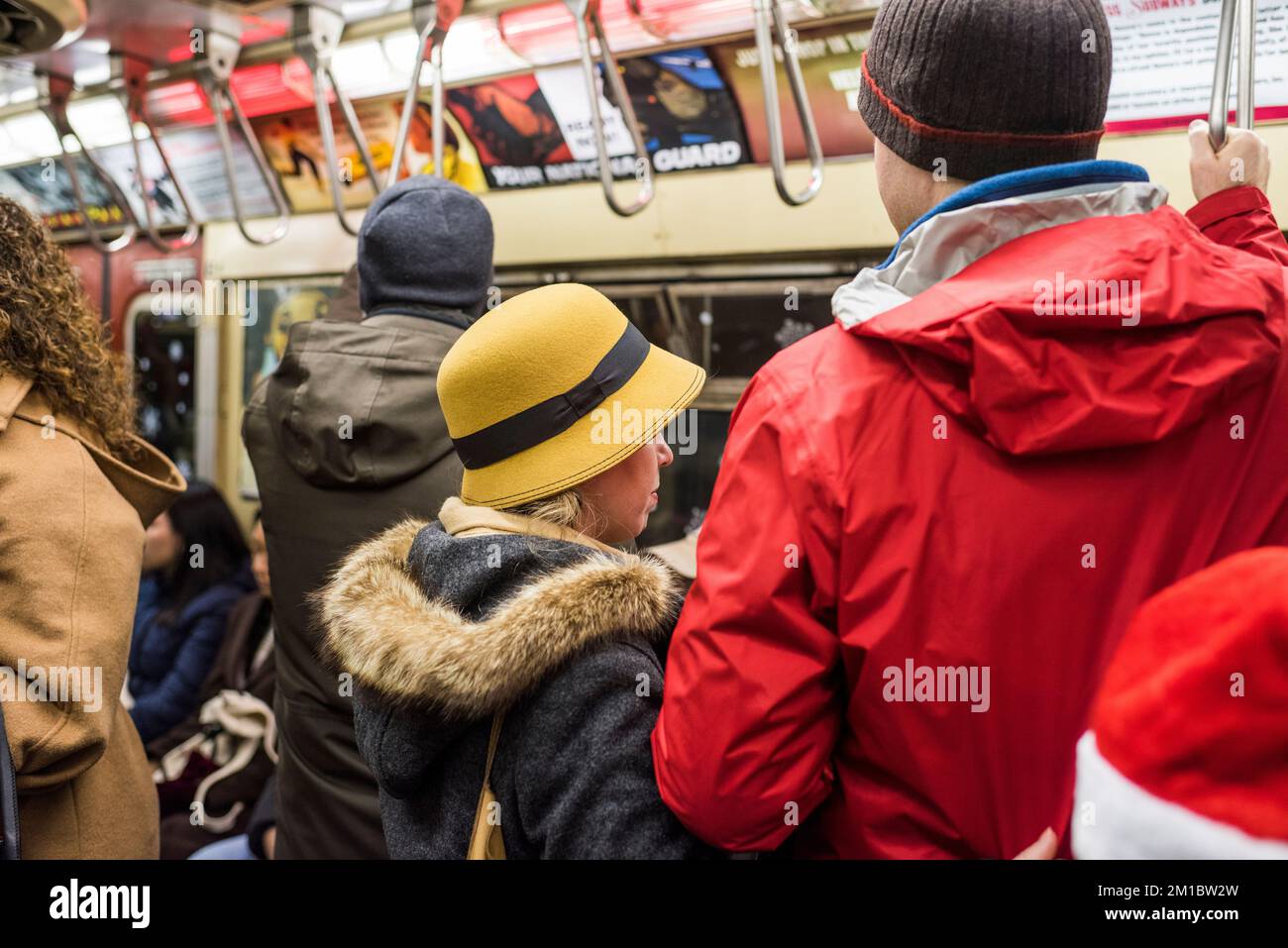 New York City, New York - December 11, 2022: People riding the Train of Many Colors, Holiday ...