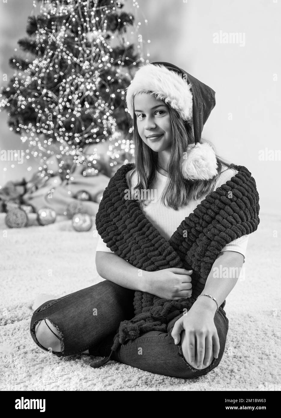 happy new year. merry christmas. cheerful teen girl wear santa hat. kid ...