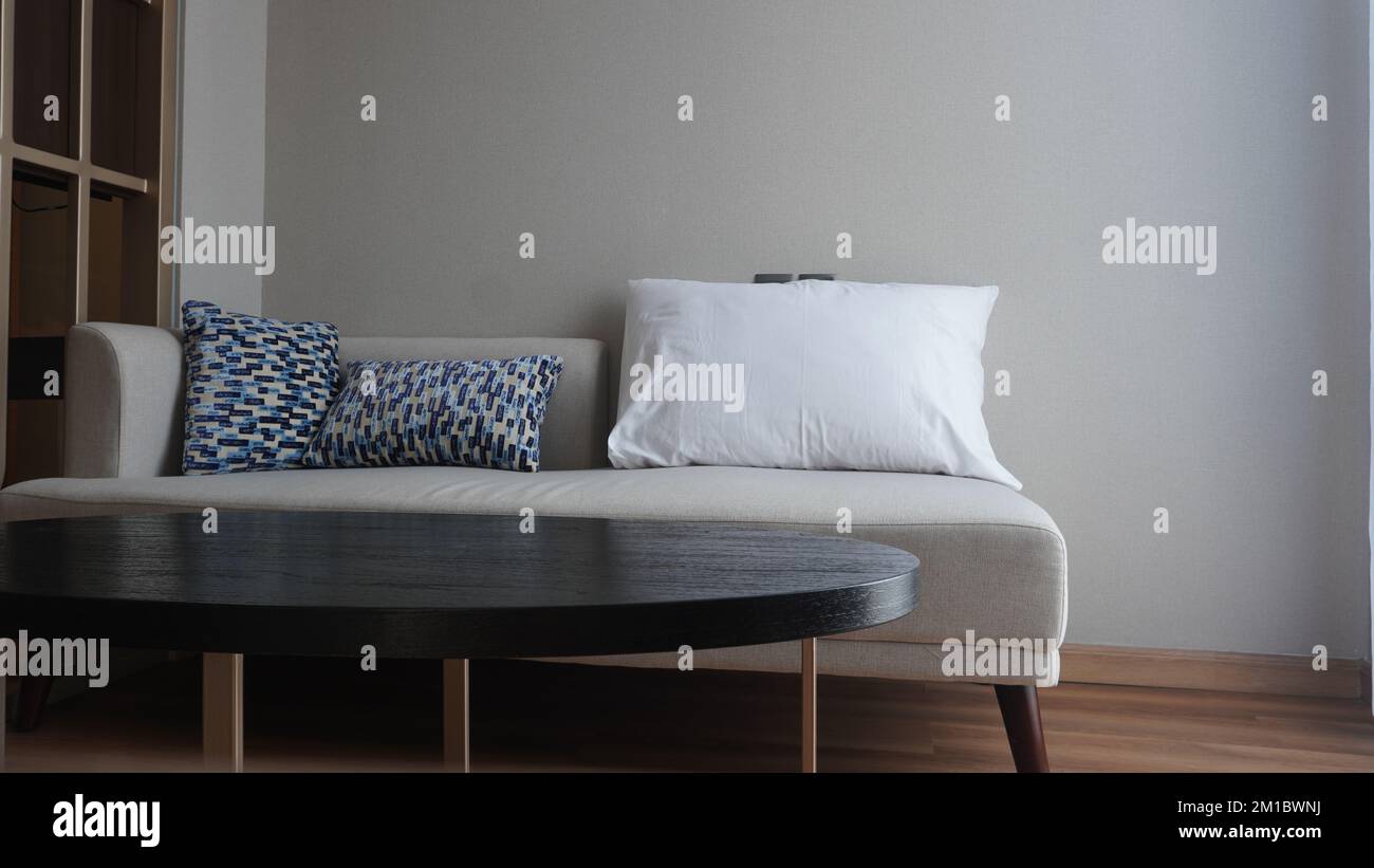 interior design of living room with coach sofa, table and pillow Stock ...