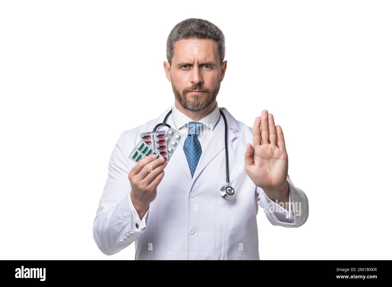 stop the allergy. doctor hold pill with stop gesture. stop taking ...