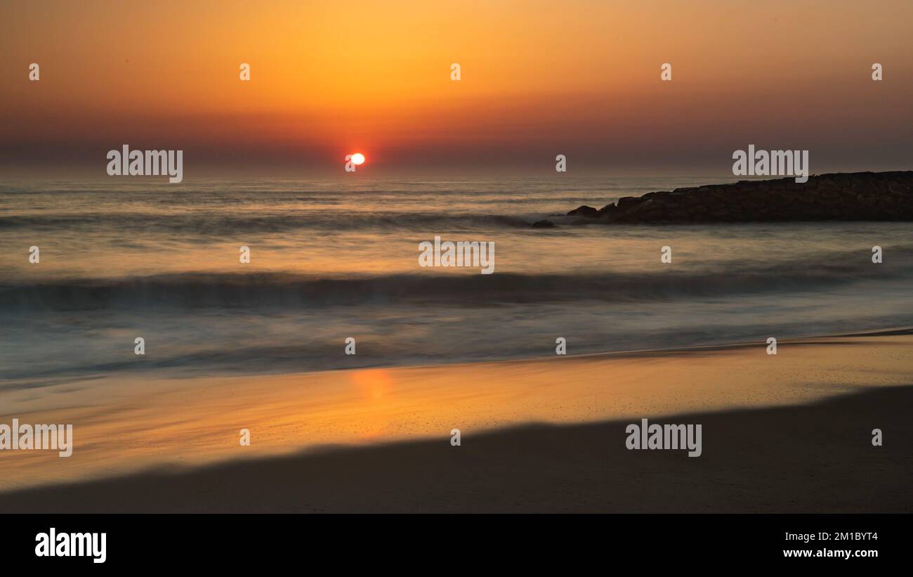 Landscape of Furadouro beach, Portugal at sunset Stock Photo - Alamy