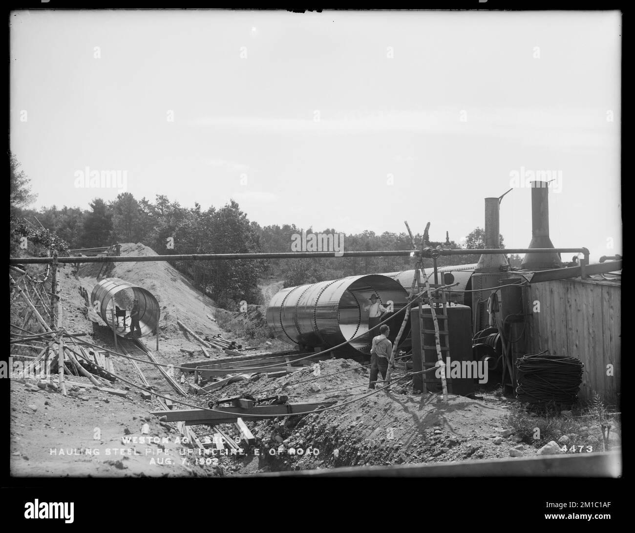 Weston Aqueduct, Section 9, hauling steel pipe up incline, east of road ...