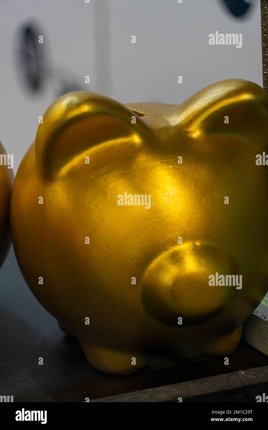 Golden Piggy Bank isolated on white background Stock Photo - Alamy