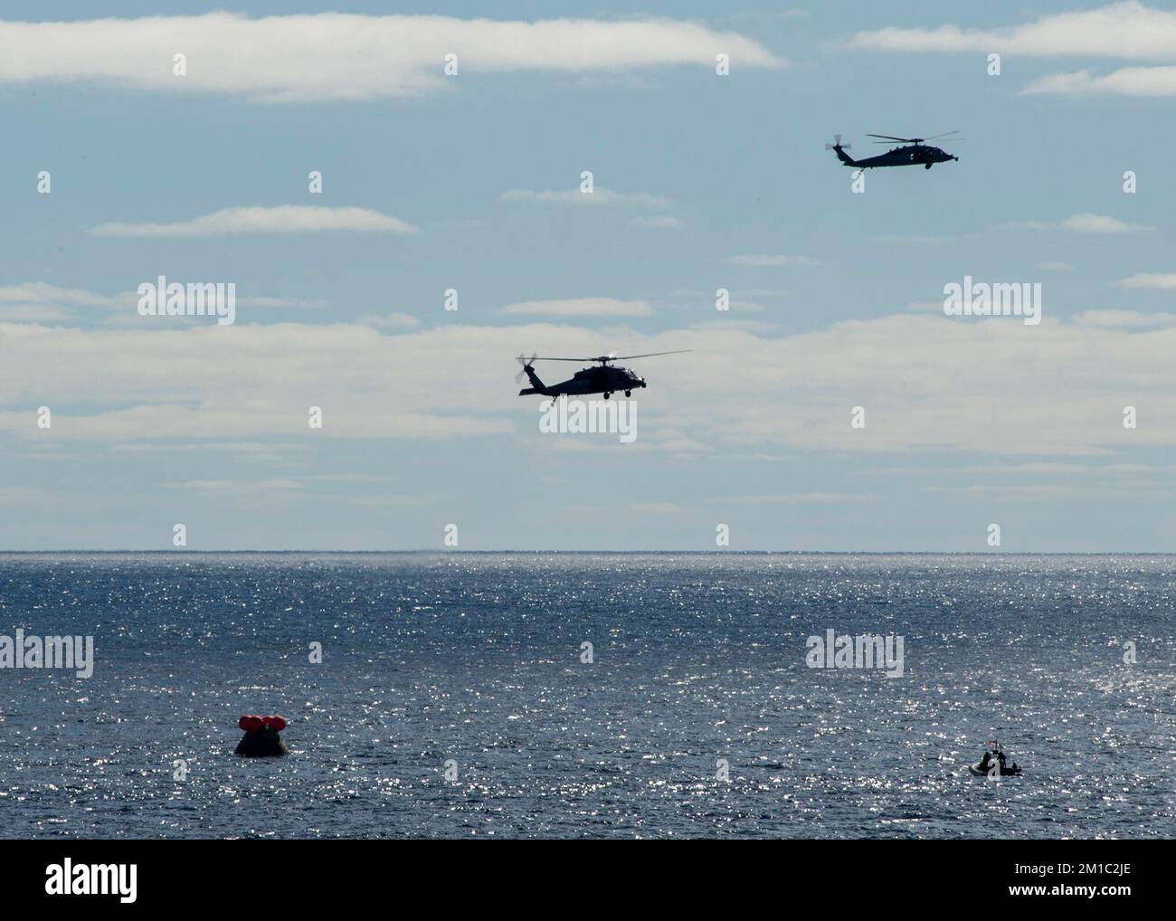 221211-N-NM271-3130 PACIFIC OCEAN (Dec. 11, 2022) Two MH-60 Seahawk ...