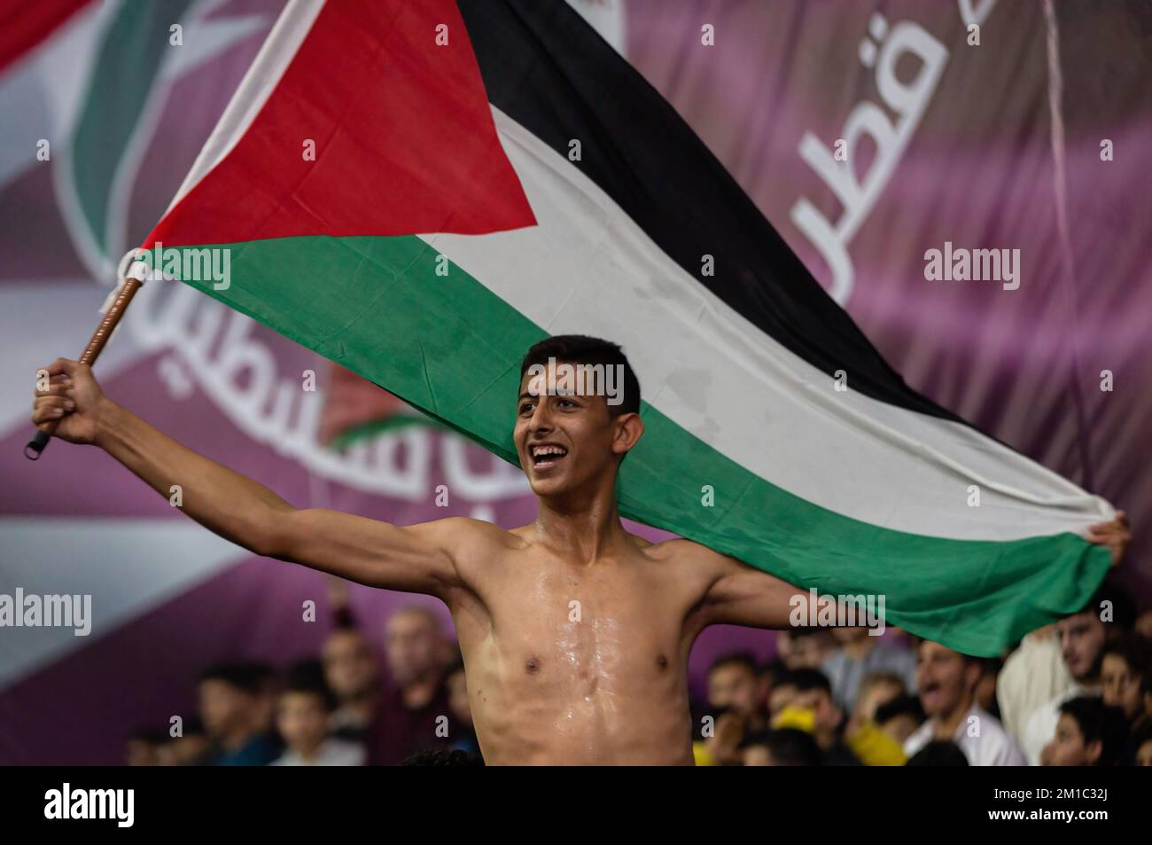 Gaza, Palestine. 10th Dec, 2022. A Palestinian waves the Palestinian ...