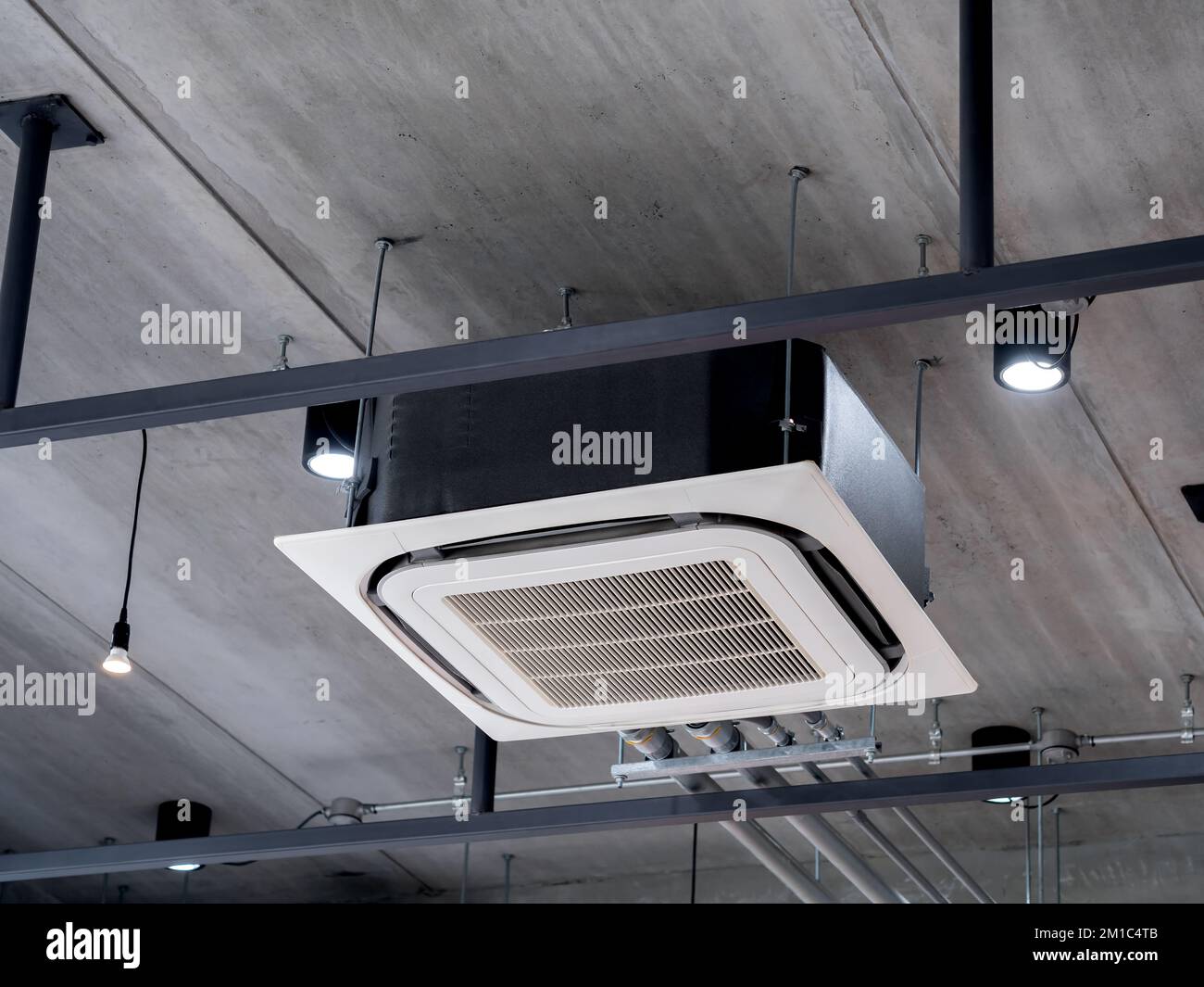 Ceiling mounted cassette type air conditioner decoration near the spot ...