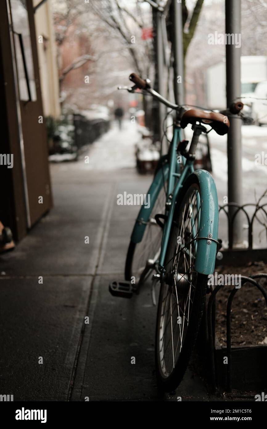 Retro vintage blue bike with leather sear in new york city manhattan ...