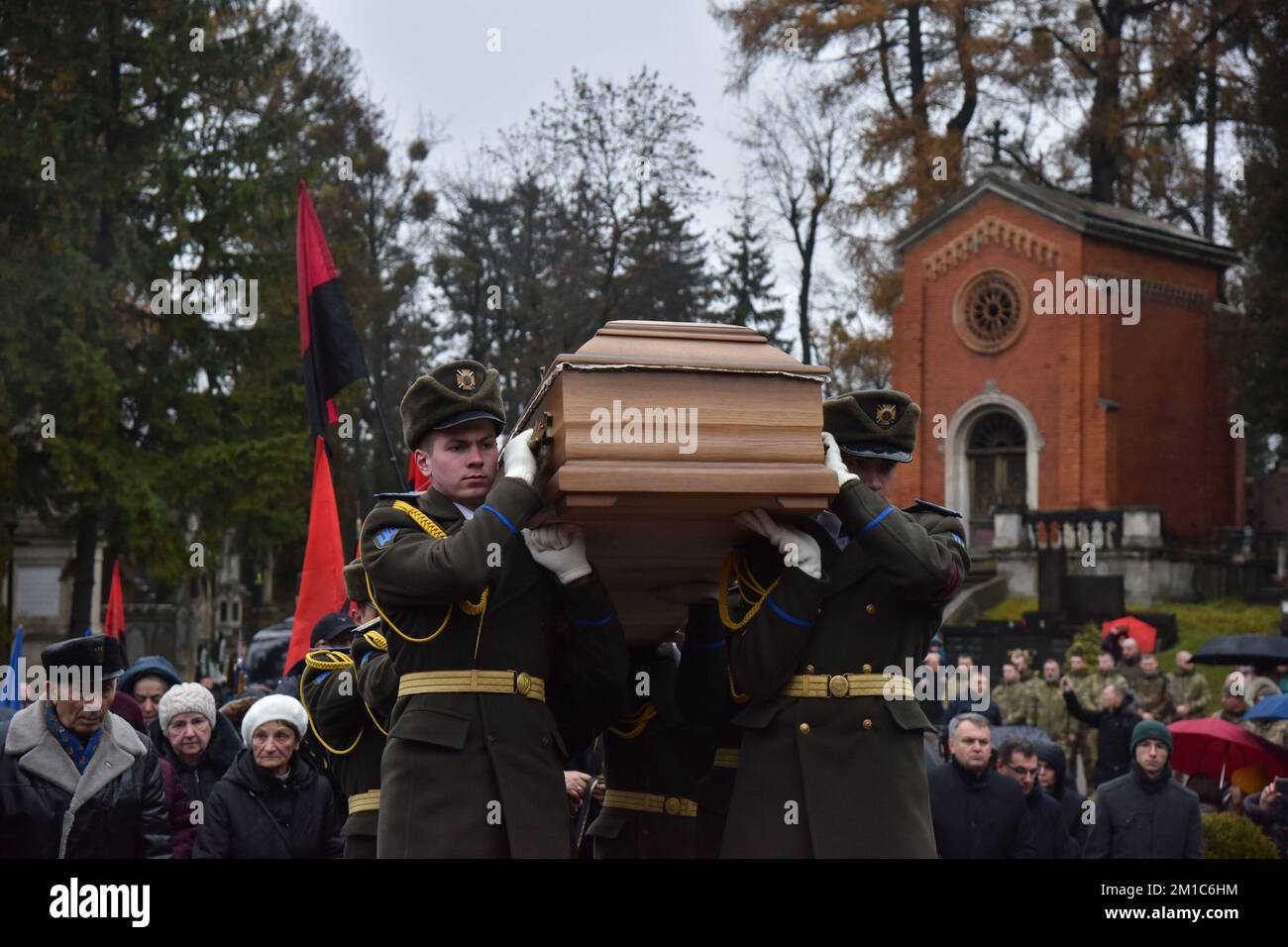 Lviv, Ukraine. 10th Dec, 2022. Military honor guards carry the coffin ...