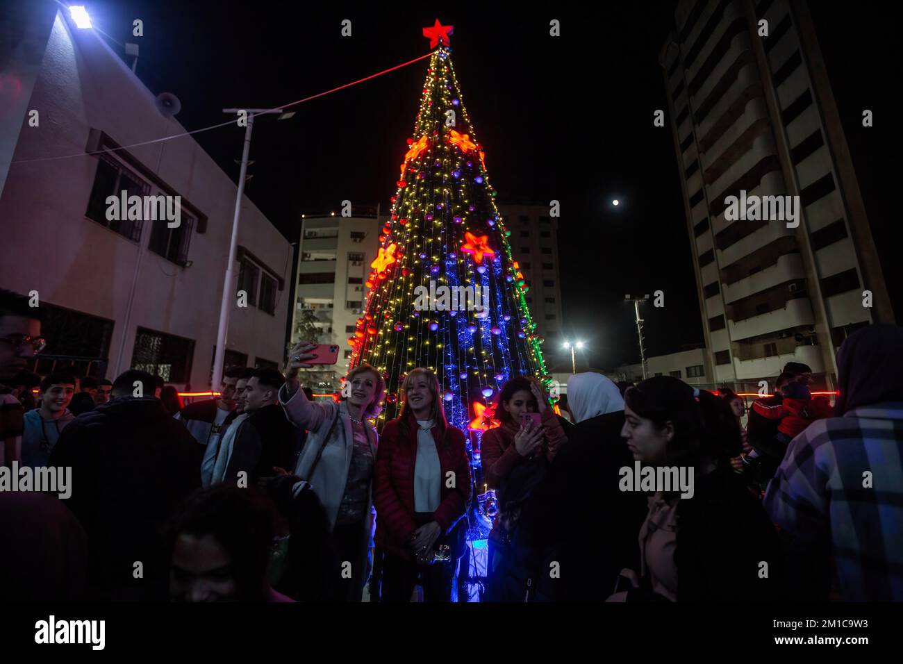 Gaza, Palestine. 10th Dec, 2022. Palestinian Christians light the ...