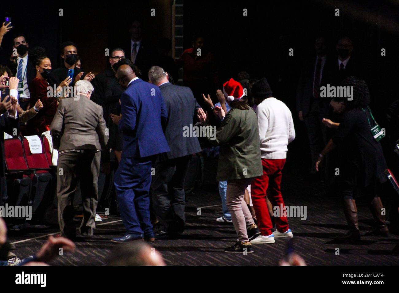 Attendees, including Amanda Gorman, dance during Stevie Wonder's ...