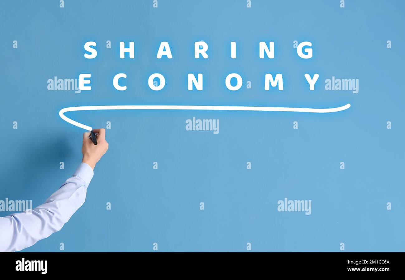 Businessman writing on virtual screen against blue background. Concept ...