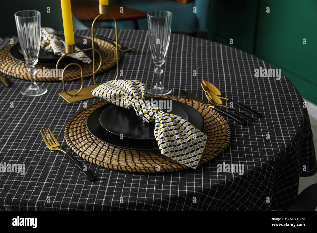 Beautiful table setting with black plates in stylish room Stock Photo ...