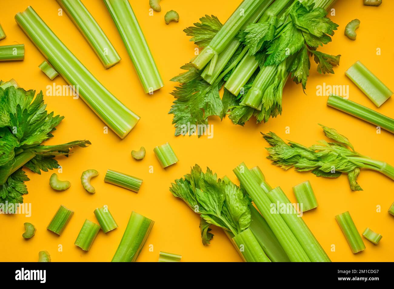 Fresh green celery on color background Stock Photo - Alamy