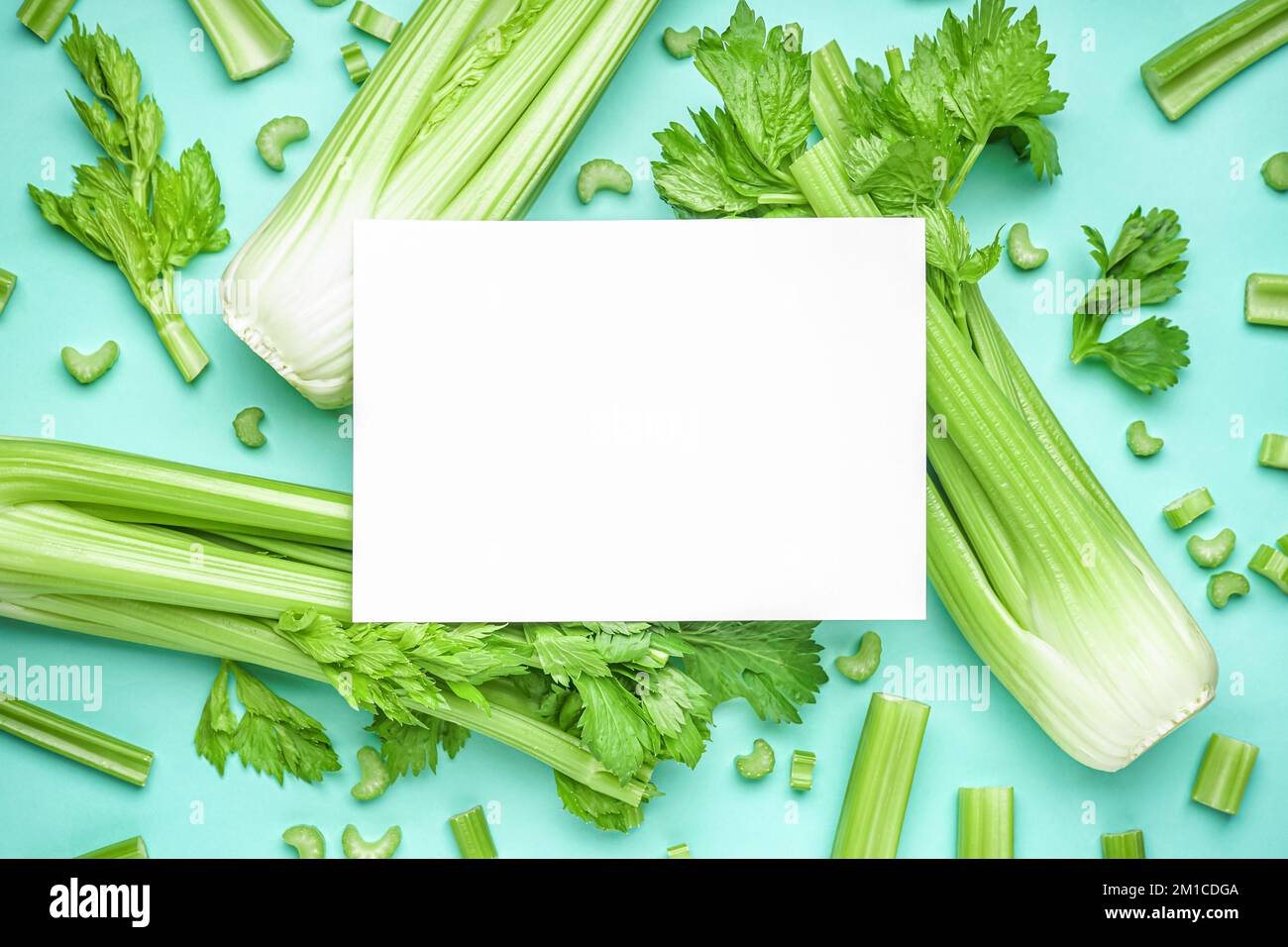 Blank card and fresh celery on color background Stock Photo - Alamy
