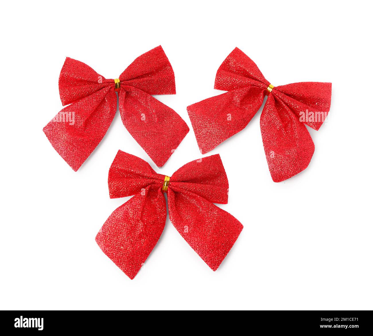 Red Christmas bows on white background Stock Photo - Alamy
