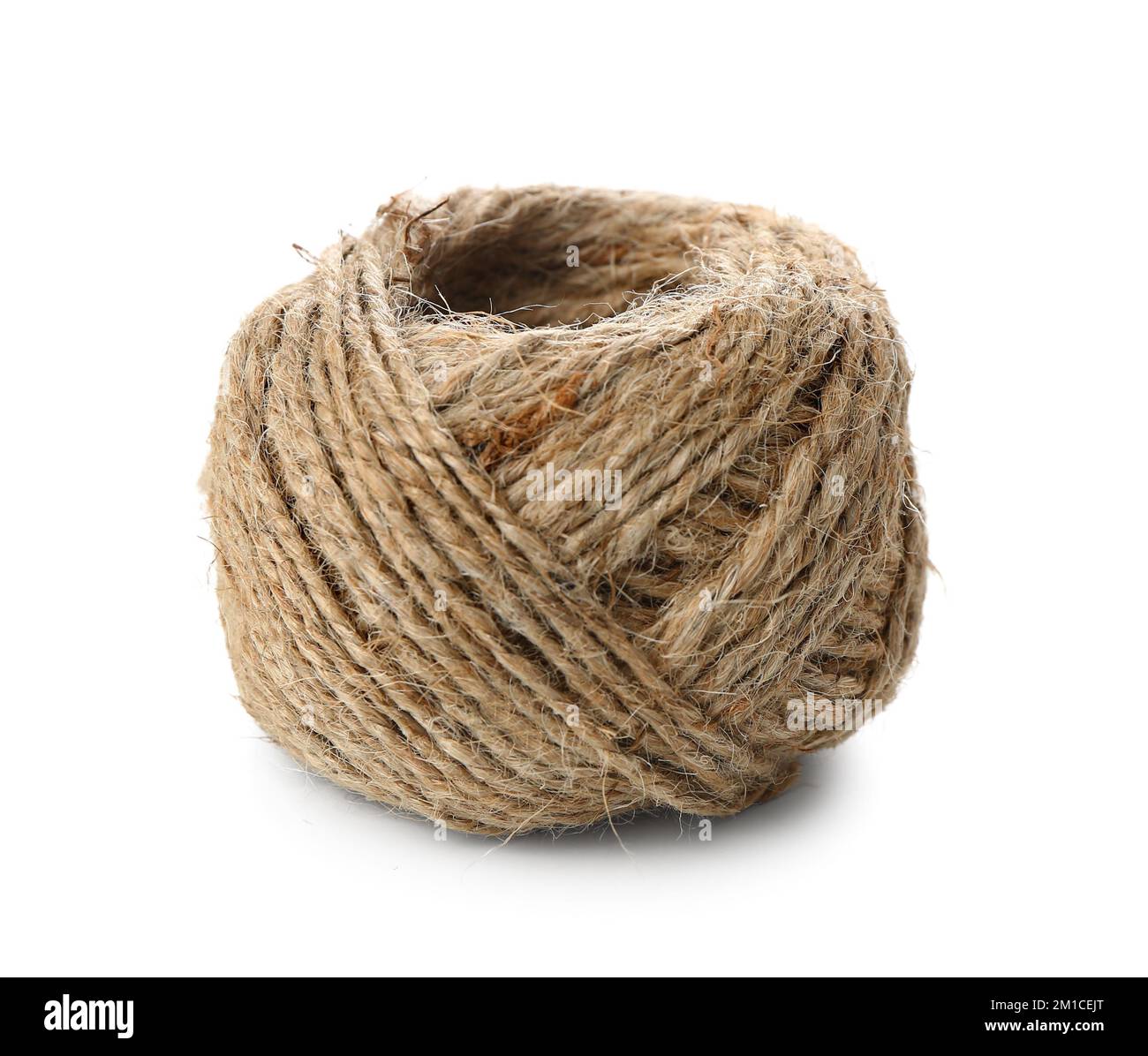 Roll of jute rope on white background Stock Photo - Alamy
