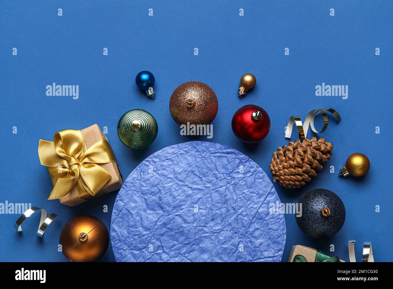 Composition with blank card, Christmas decorations and gift on color ...