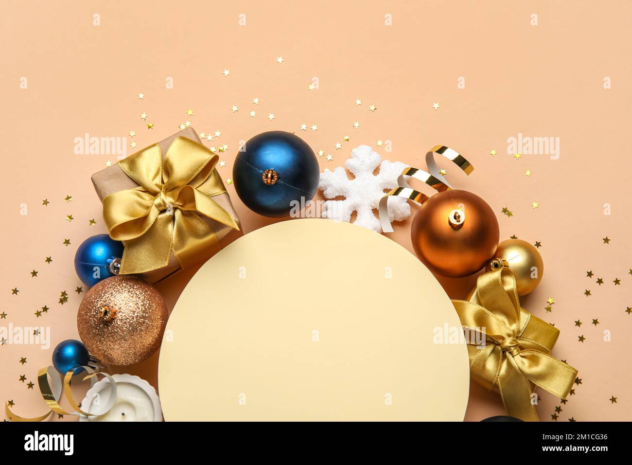Composition with blank card, Christmas decorations and gifts on color ...