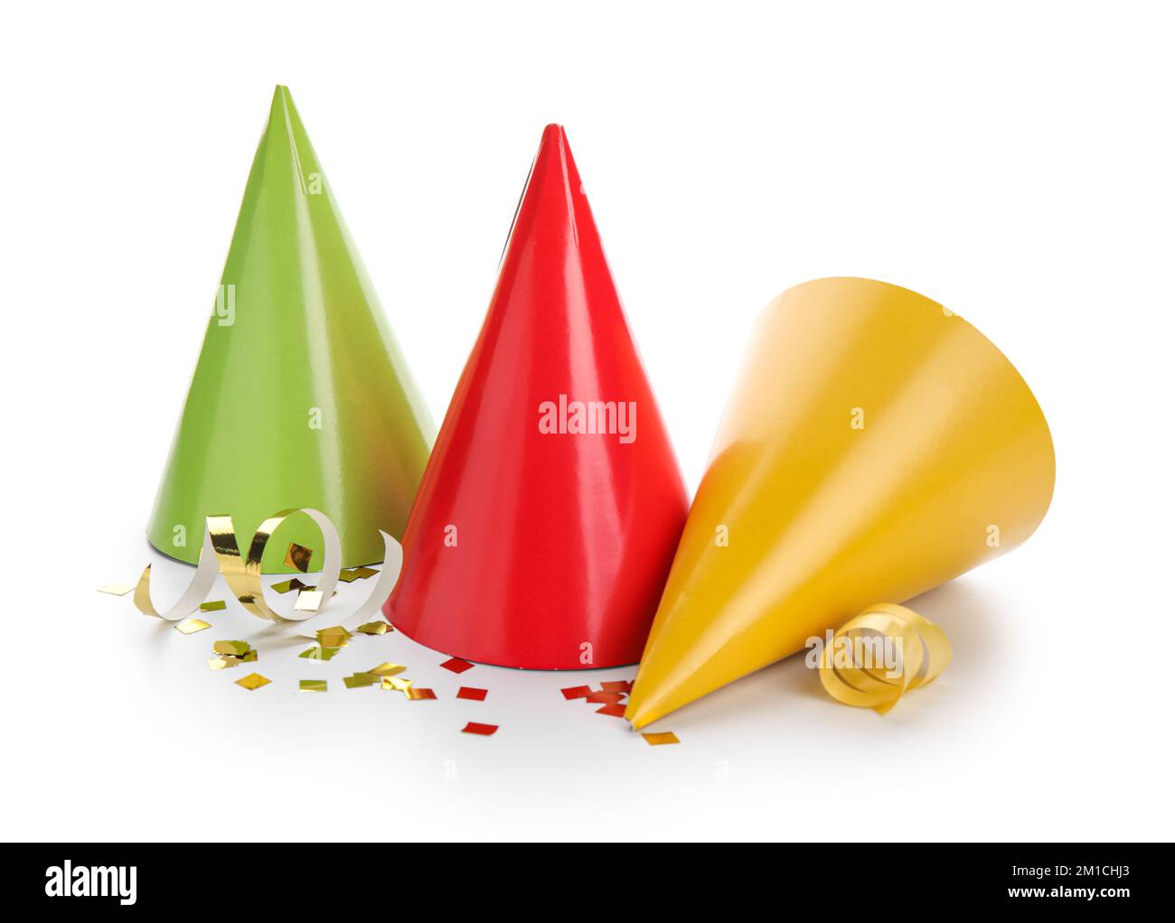 Colorful party hats with confetti on white background Stock Photo - Alamy