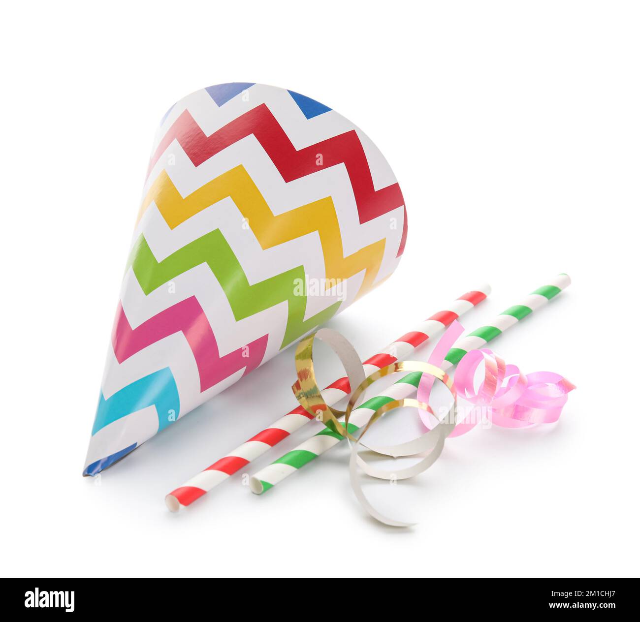 Multicolored party hat with confetti and straws on white background ...