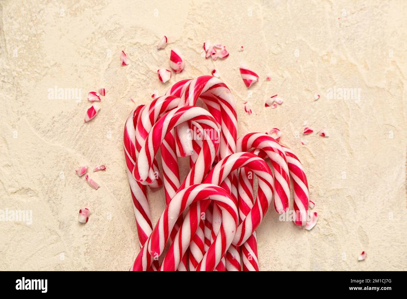 Delicious candy canes on color background, closeup Stock Photo - Alamy