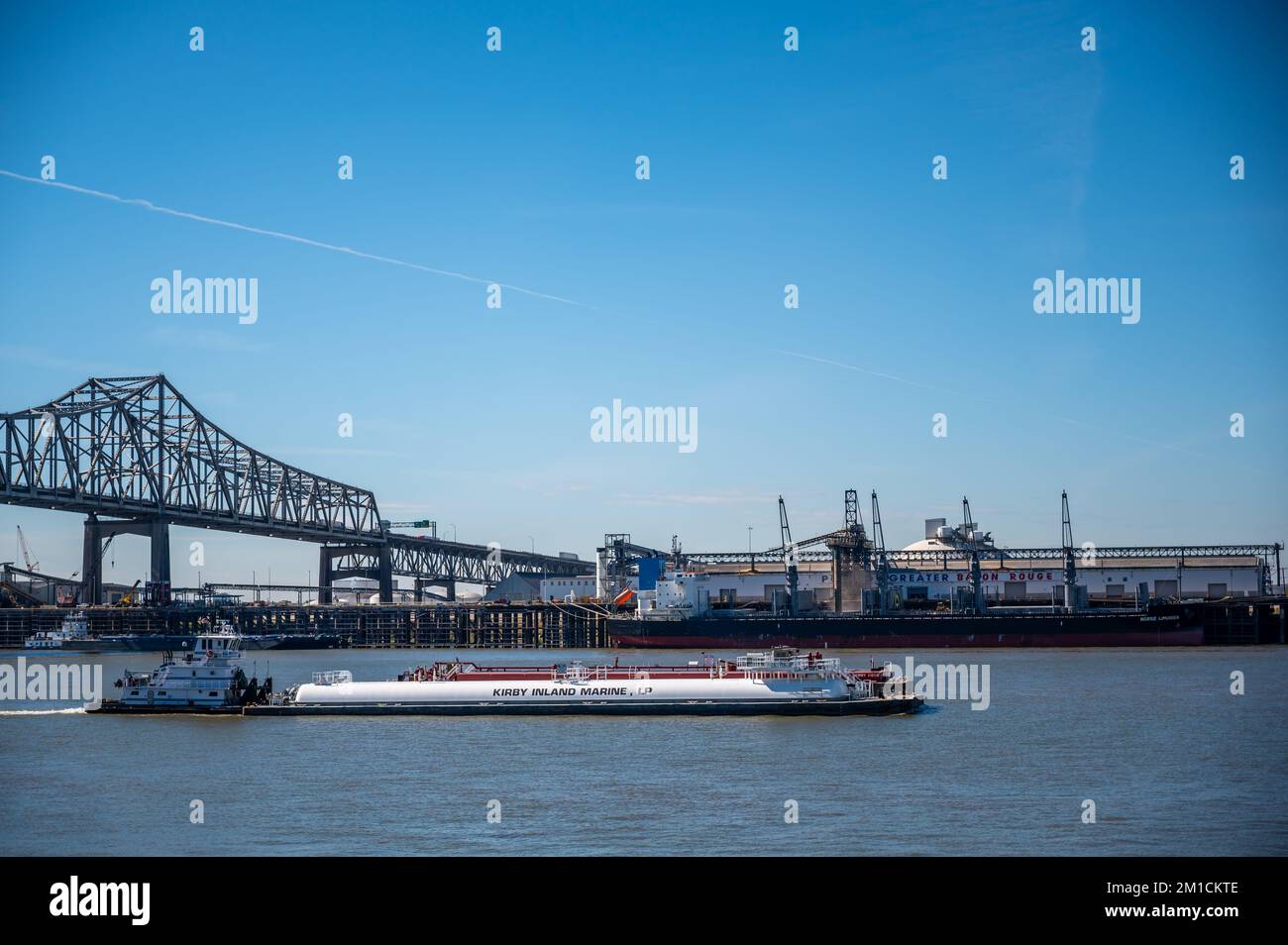 Baton Rouge, Louisiana, USA - 11.2022 - Barge crossing under the Horace ...