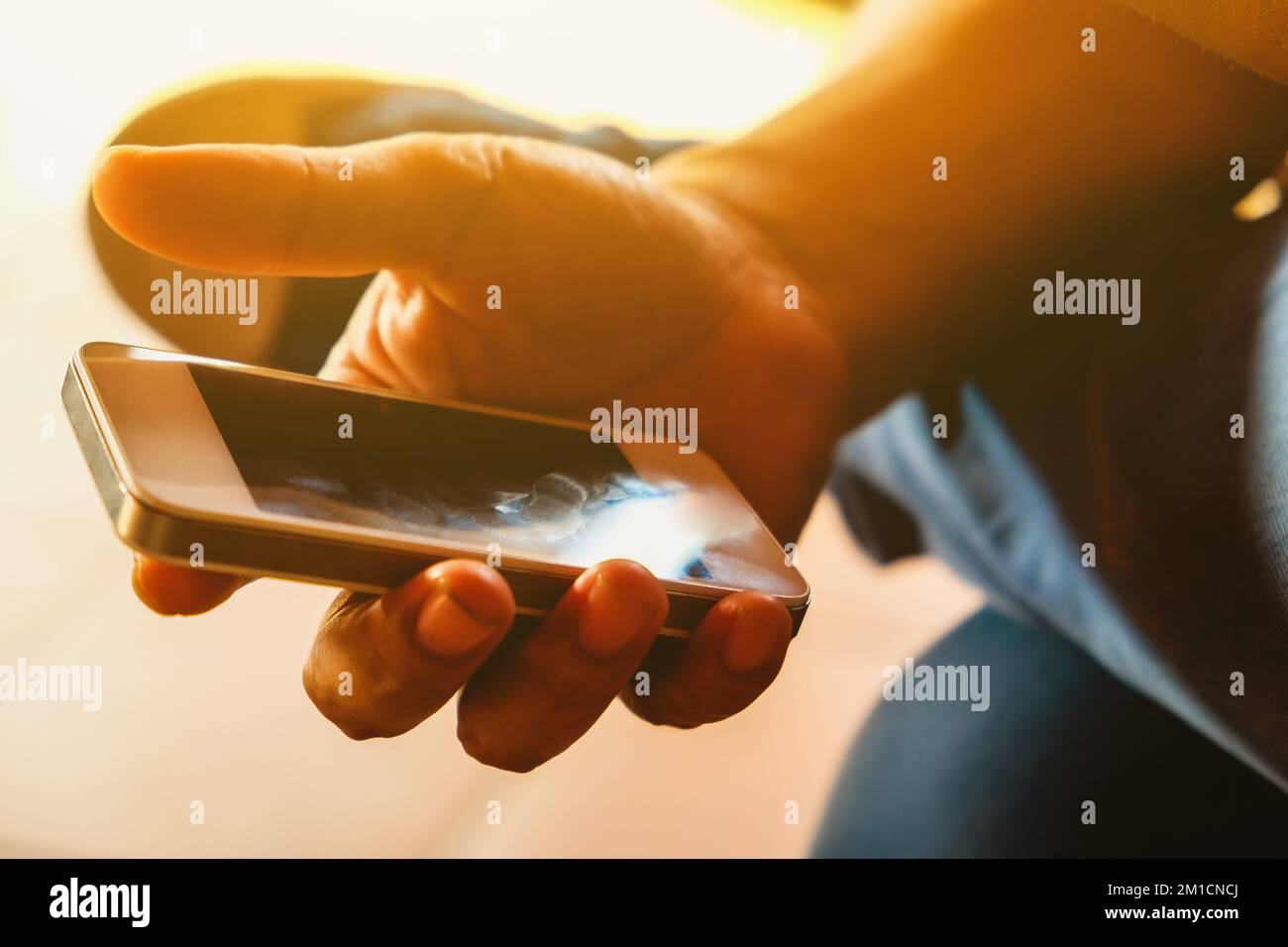 Image of Teenage guy text messaging on his phone Stock Photo - Alamy