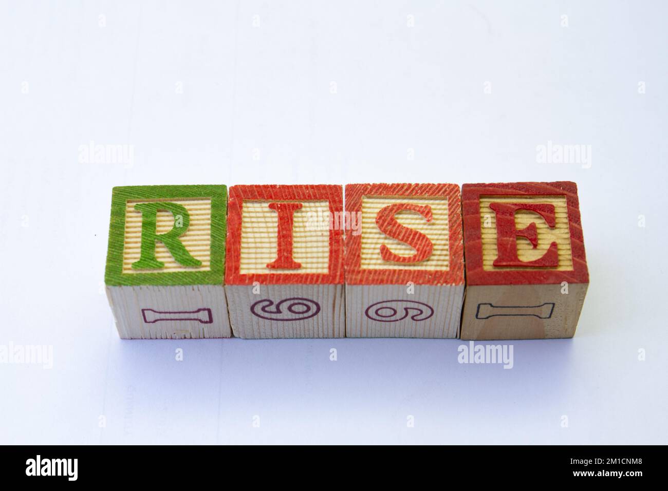 The term rise visually displayed on a clear background with copy space ...