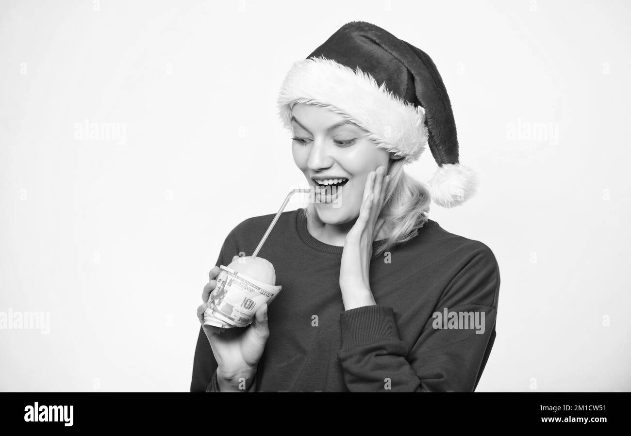Girl with lemon and money. Lemon money concept. Girl santa hat drink ...