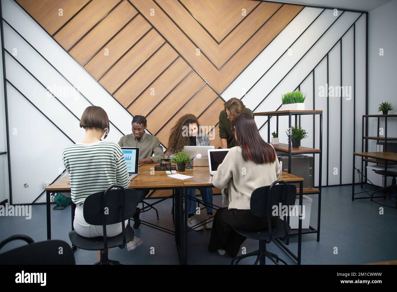 business team working in a modern office Stock Photo - Alamy