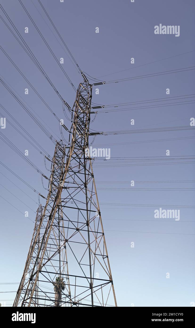 electrical power lines. pylon producing energy. voltage transmission on ...