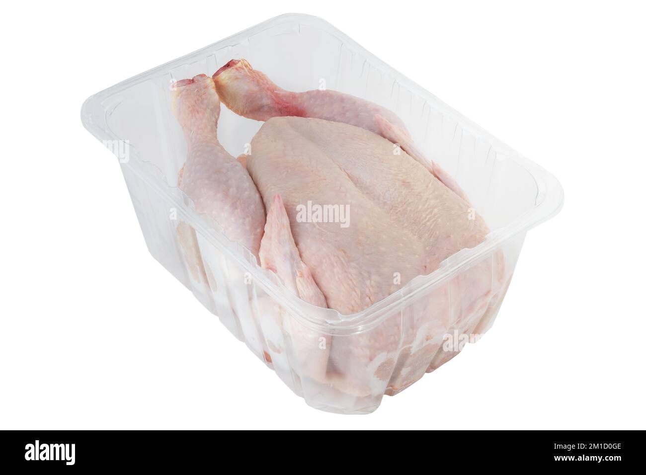 A whole clean chicken in plastic container isolated on white white ...