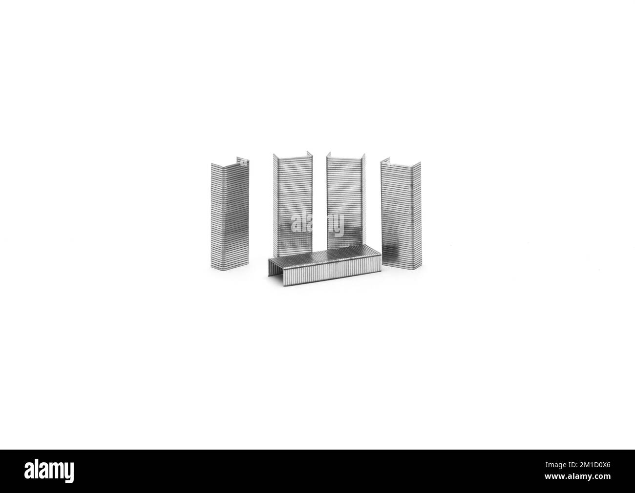 Bunch of staples stack on isolated white background Stock Photo - Alamy