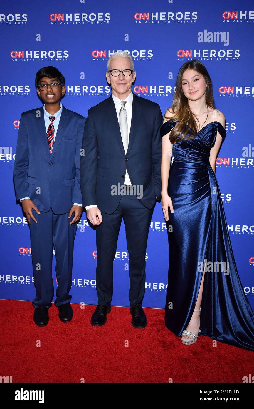L-R) Sri Nihal Tammana, Anderson Cooper, and Ruby Chitsey attend the ...