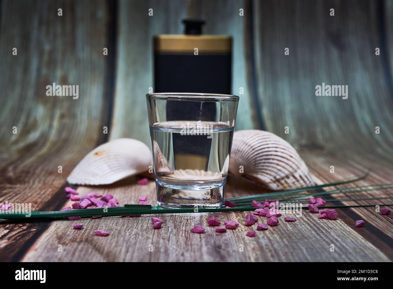 vodka shot sea shells and drinking flask on wood Stock Photo - Alamy